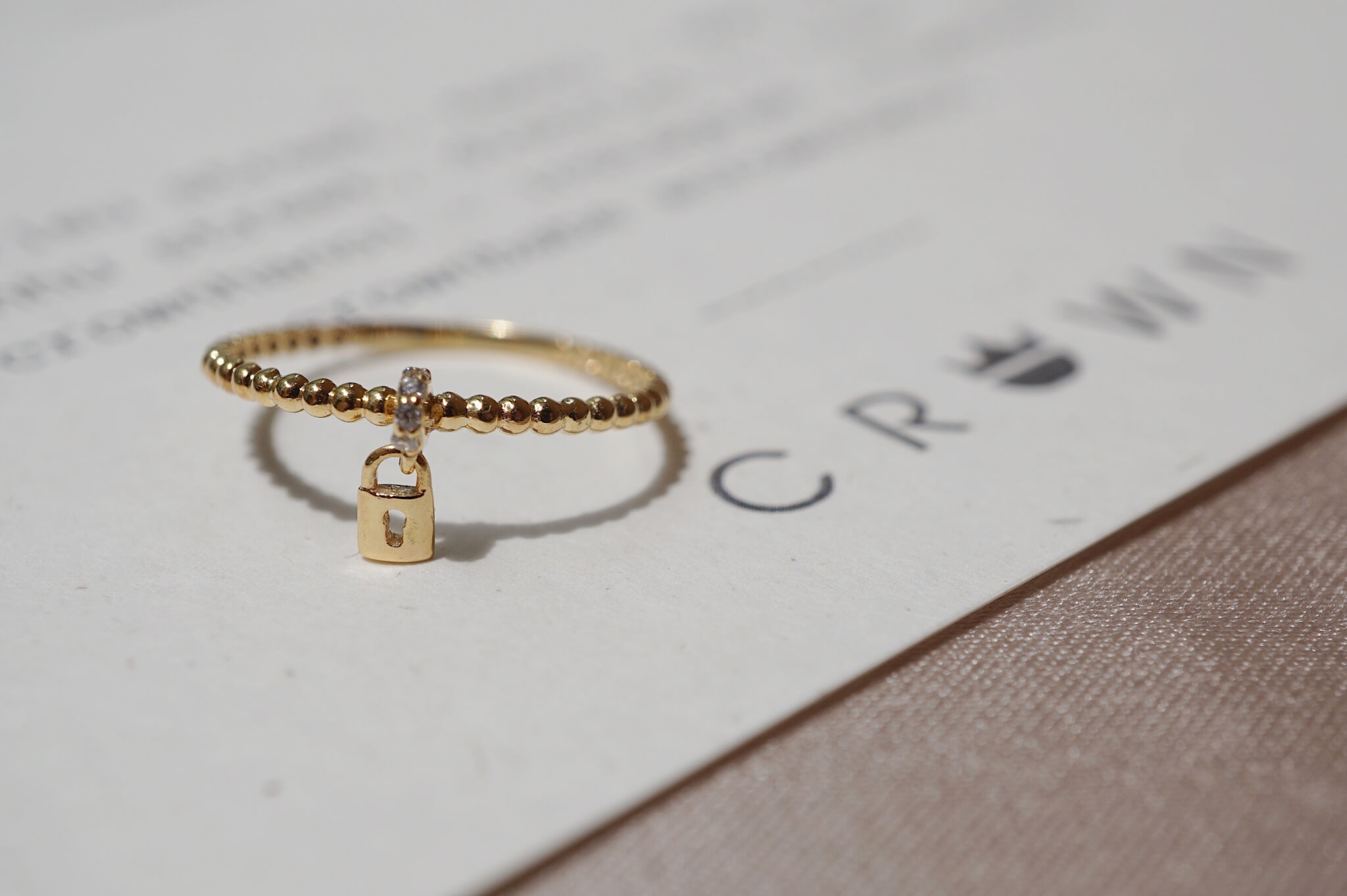 DROP KEY BEADED RING – CROWN