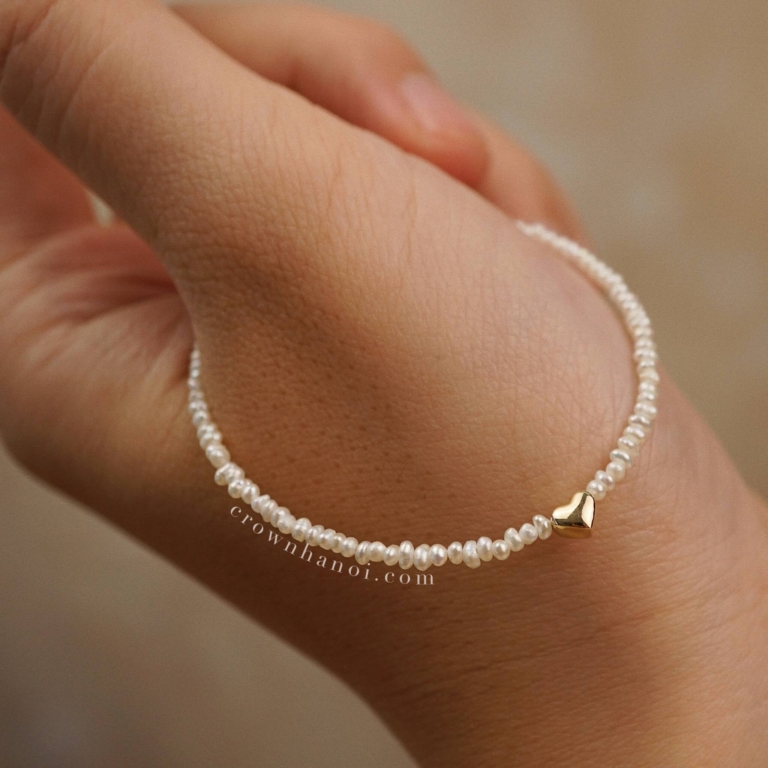 REVOLVING HEART – BABY PEARL BRACELET – CROWN